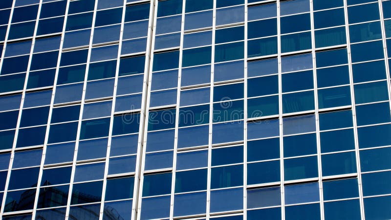 BLUE GLASS WALLS BUILDING with WHITE FRAMES Stock Image - Image of ...