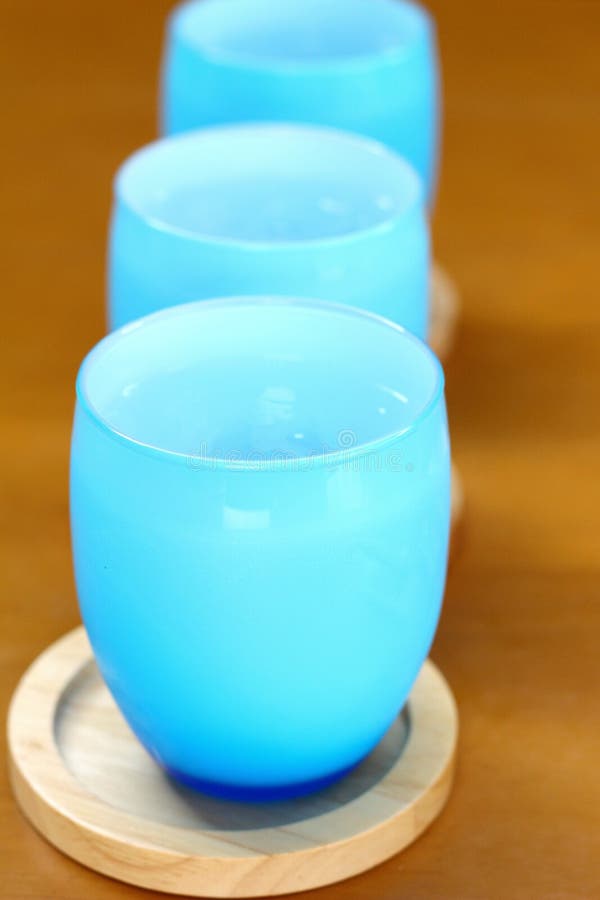 Blue Glass of Water on Table Stock Photo - Image of water, fresh: 51659404