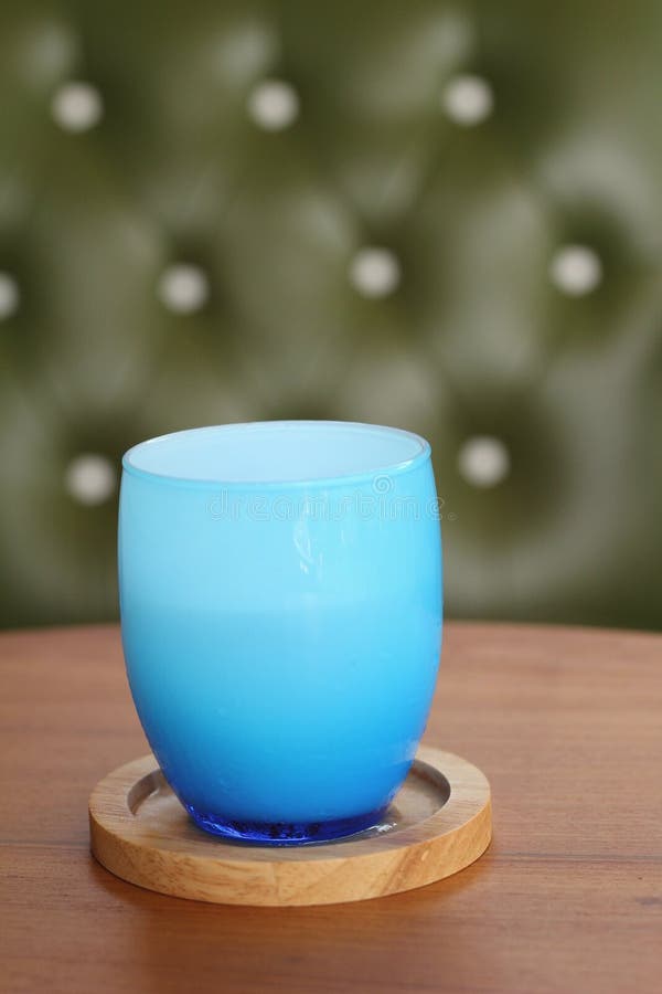 Blue Glass of Water on Table Stock Image - Image of water, beautiful ...