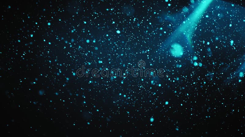 Blue Glitter Particles Falling in Light Rays Stock Footage - Video of ...