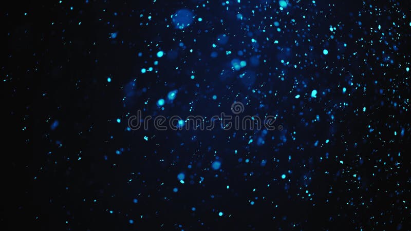 Blue Glitter Particles Falling in Light Rays Stock Video - Video of ...