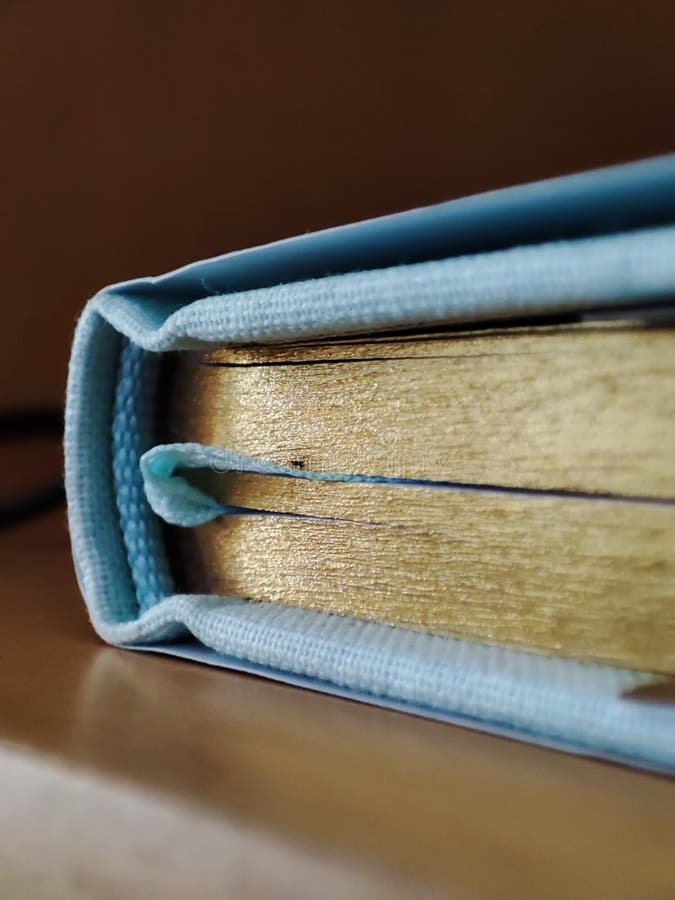 Blue and gold book, detail stock photo. Image of blue - 249392590