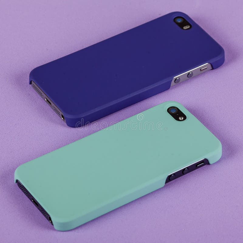 Blue and Green Cell Phone in Case on Purple Background Stock Image ...