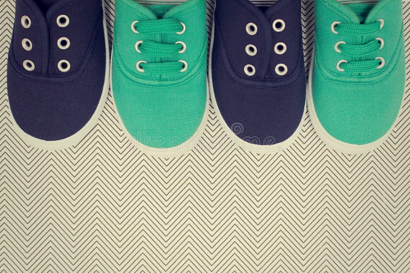Blue and Green Shoes on the Background with Zigzags Stock Image - Image ...