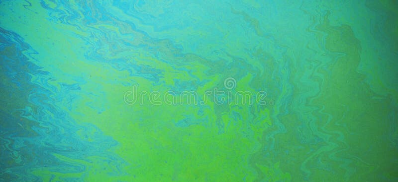Blue, Green, Yellow Color Oil Patterns on the Surface of the Water ...