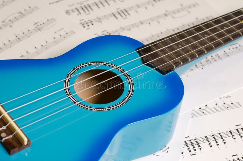 Blue guitar stock photo. Image of blue, instrument, activity - 73391840