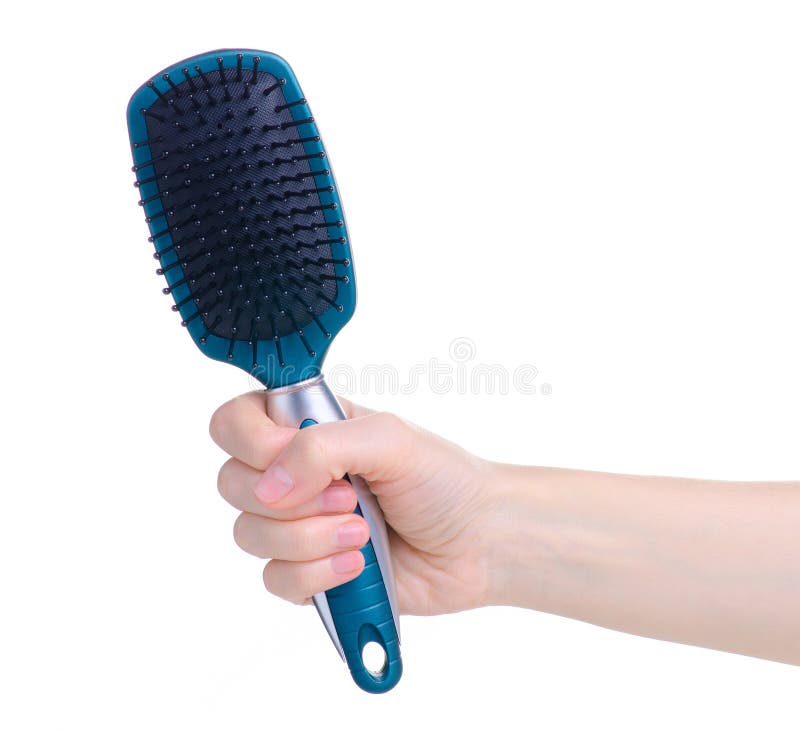 Blue hair brush in hand stock image. Image of accessory - 180152577