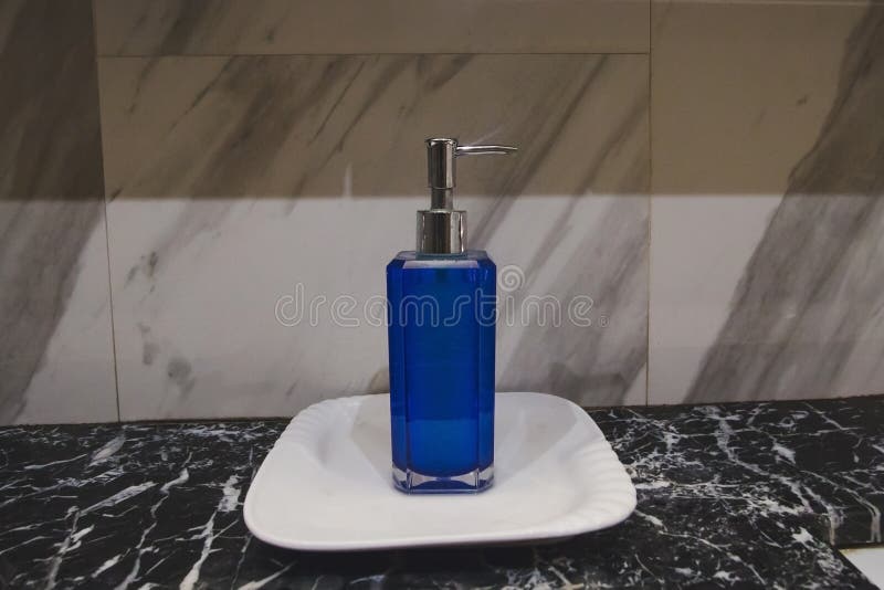 Blue Hand Soap Bottle in the Bathroom Stock Photo - Image of clean ...