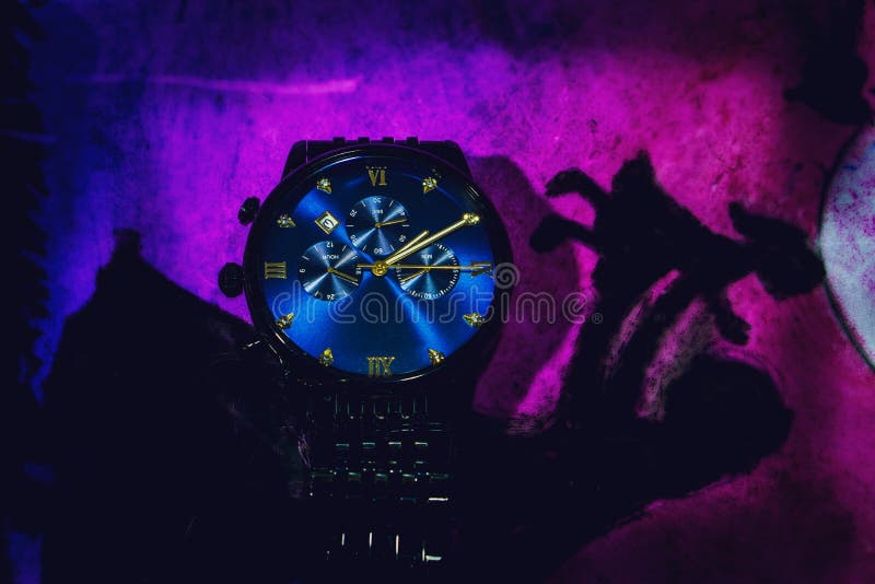 Blue Hand Watch on a Pink and Blue Texture Stock Image - Image of black ...