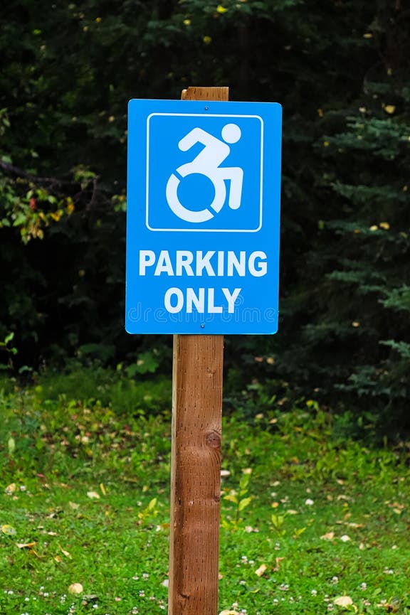 A Blue Handicap Parking only Sign on a Post Stock Photo - Image of ...