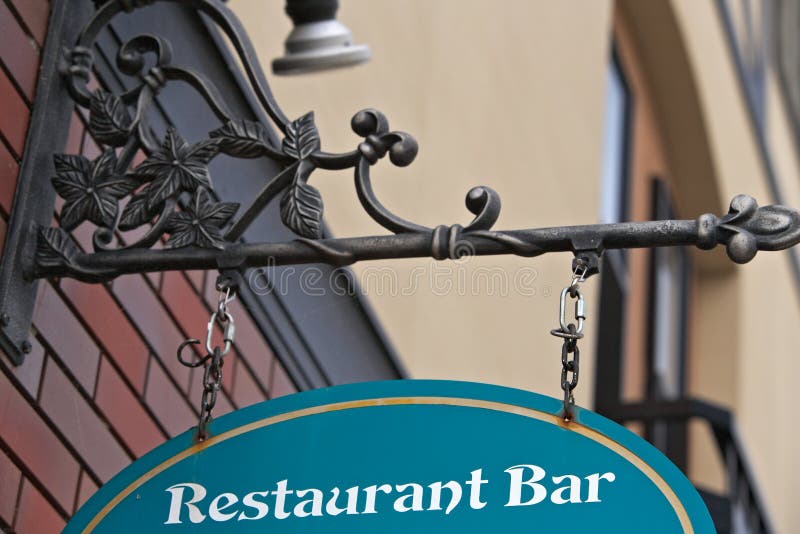 Blue Hanging Sign that Reads Bar Restaurant Stock Image - Image of blue ...