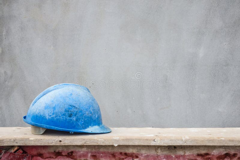 Blue Hard Hat on Building Construction Site Stock Image - Image of ...