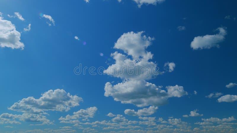 Blue Heaven Summer Cloudscape. Rolling Puffy White Clouds are Moving ...