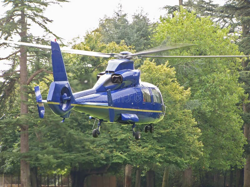 Blue Helicopter stock photo. Image of airborne, ride, clouds - 280438