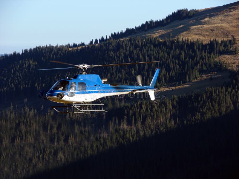 Underneath View of Rescue Helicopter Flying Above. Stock Photo - Image ...