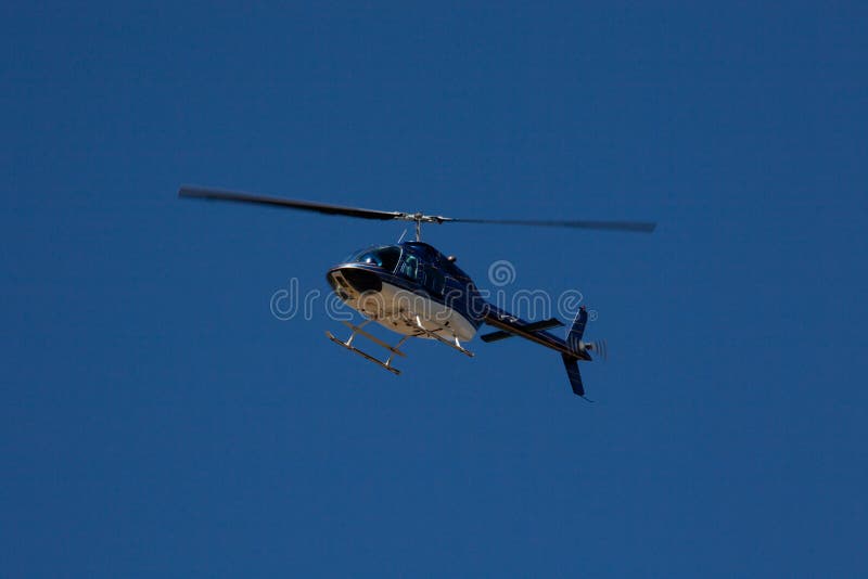 Blue Helicopter stock photo. Image of airborne, ride, clouds - 280438