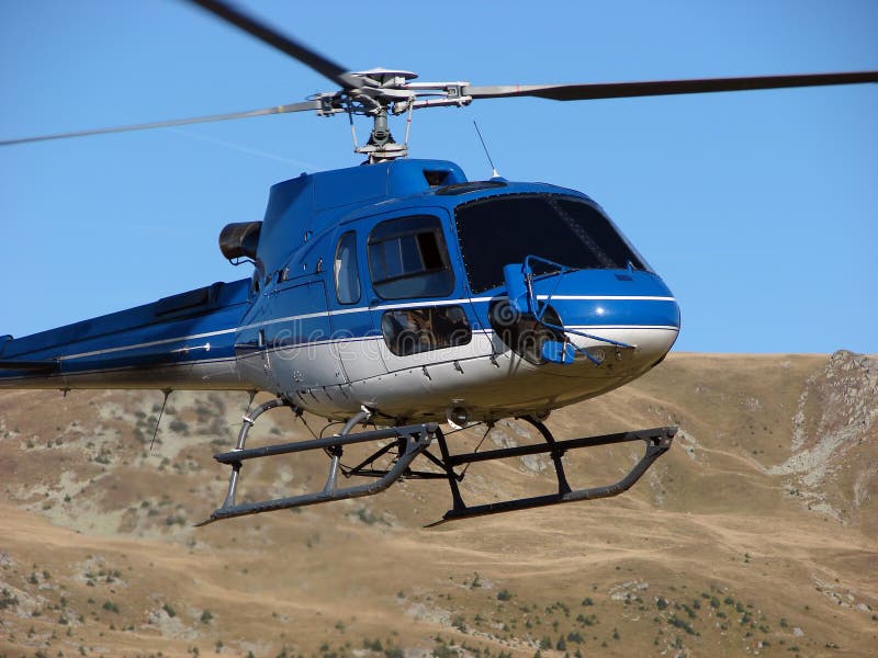 Blue helicopter flying stock photo. Image of propeller - 111992350