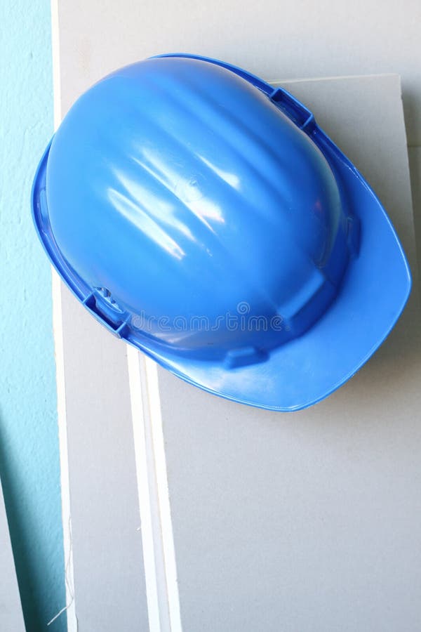 Blue helmet stock photo. Image of caution, construction - 27202076