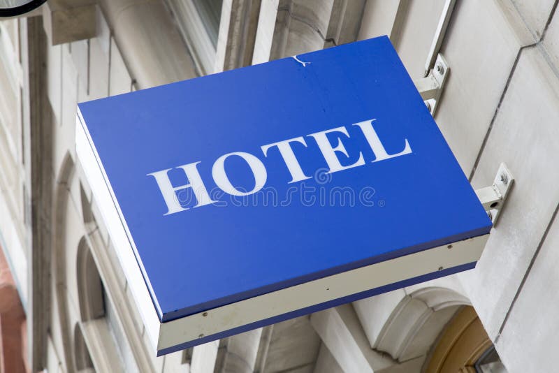 Blue Hotel Sign on Building Stock Photo - Image of travel, tourism ...