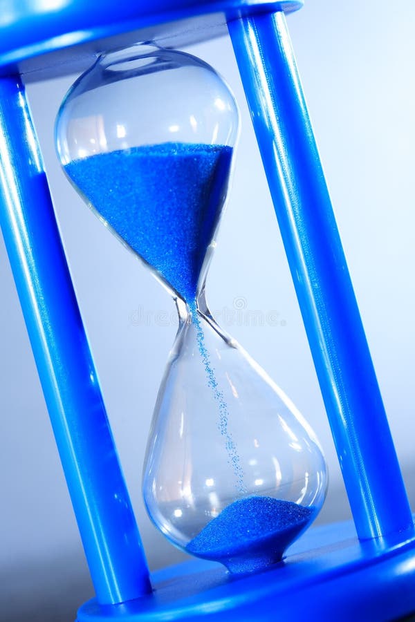 Blue Hourglass Closeup stock photo. Image of glass, vintage - 66473906