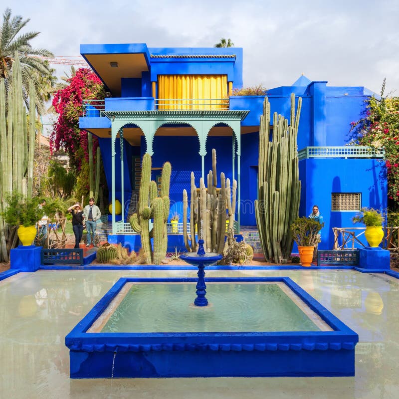 A Blue House with a Fountain and Cacti Stock Illustration ...