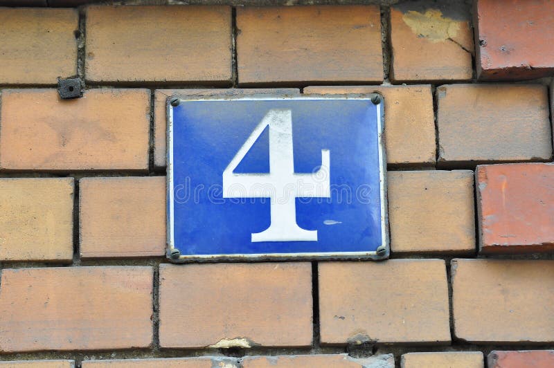 A Blue House Number Plaque, Showing the Number Four Stock Image - Image ...