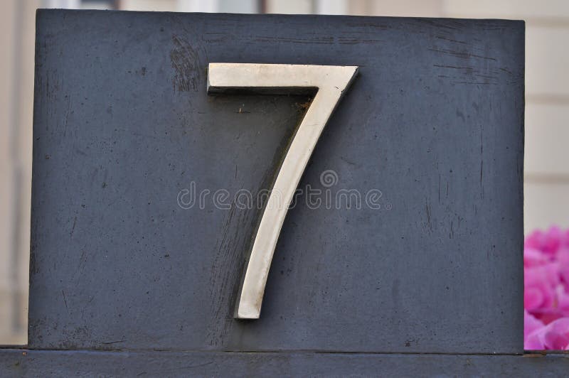 A Blue House Number Plaque, Showing the Number Seven Stock Photo ...