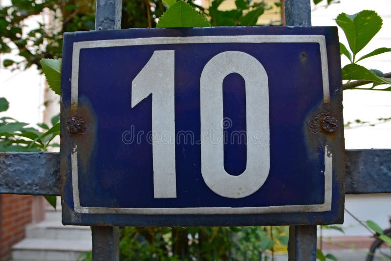A Blue House Number Plaque, Showing the Number Ten Stock Photo - Image ...