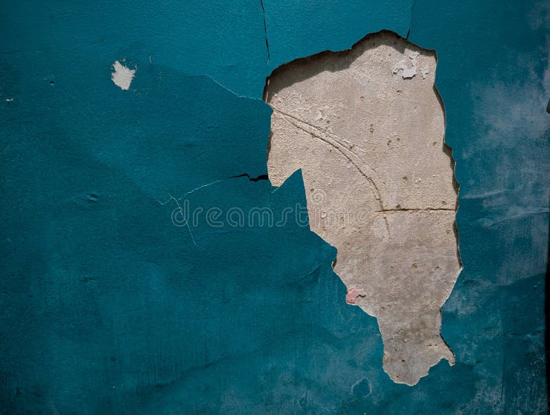 A Blue House Wall Whose Paint is Peeling and Damaged Stock Image ...