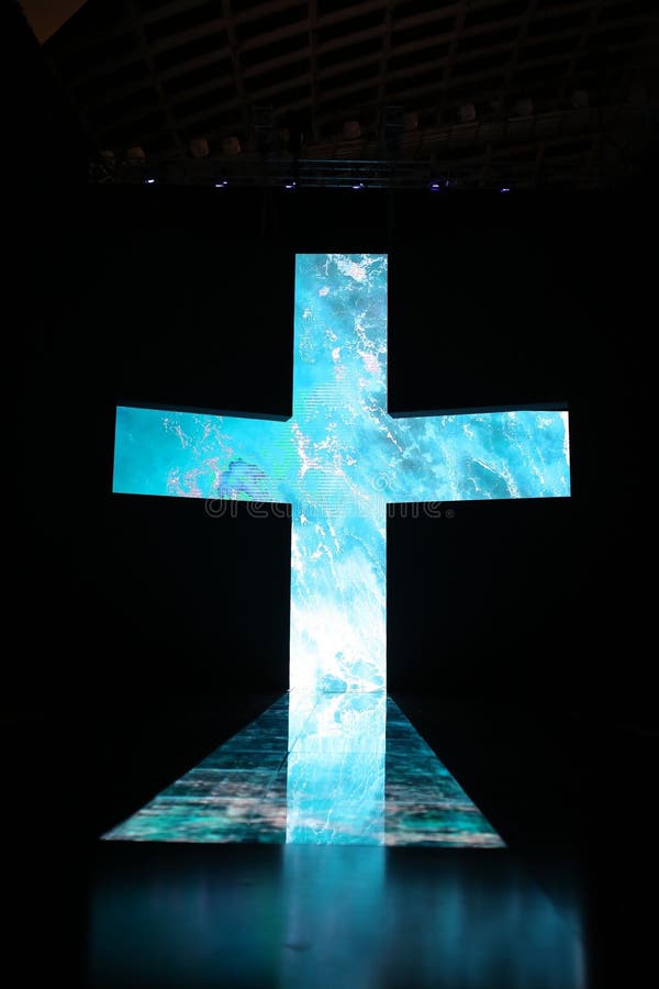 Blue-hued Cross on a Pedestal in the Dark Stock Image - Image of bright ...