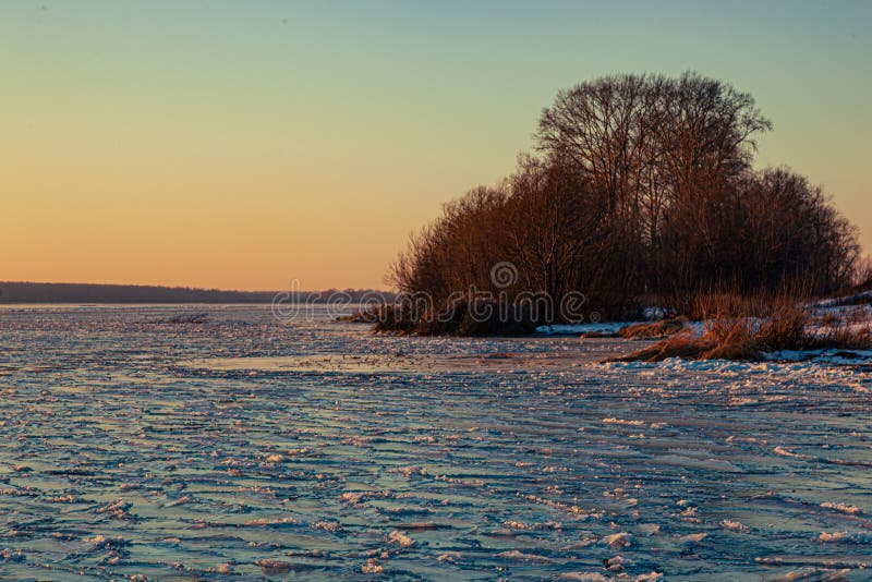 Ice on the river at sunset stock image. Image of park - 208725451
