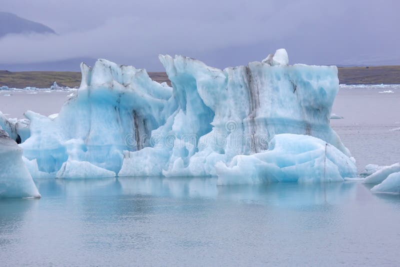 Blue Ice on the Shore of the Ice Lagoon in Iceland Stock Photo - Image ...