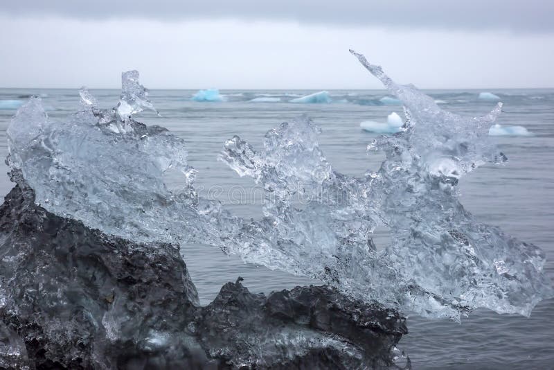 Blue Ice on the Shore of the Ice Lagoon in Iceland Stock Image - Image ...