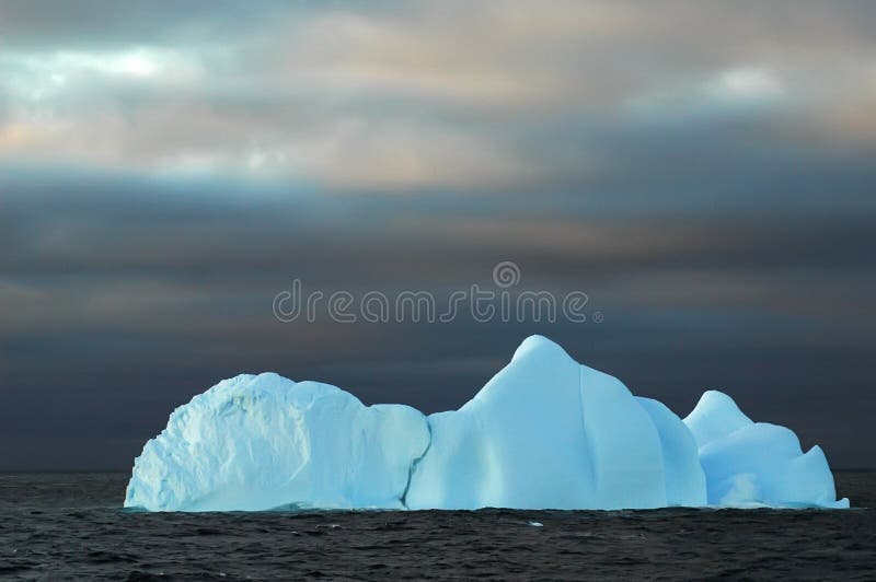 Smooth blue iceberg stock image. Image of cool, ocean - 14169311