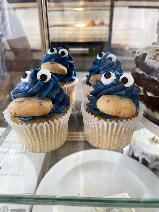 Blue Cookie Monster Cupcakes in a Bakery Stock Photo - Image of dessert ...