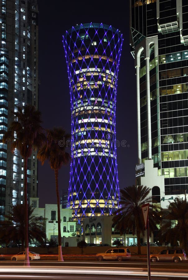 Illuminated QIPCO Tower, Doha Editorial Photography - Image of night ...