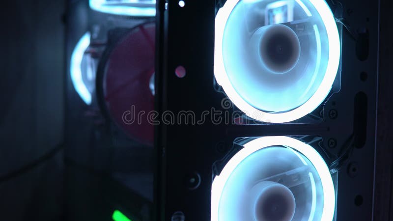 Blue Illumination of the Fan in the Pc Case. Blue Blades Spin To Cool ...