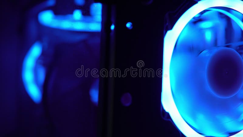 Blue Illumination of the Fan in the Pc Case. Blue Blades Spin To Cool ...