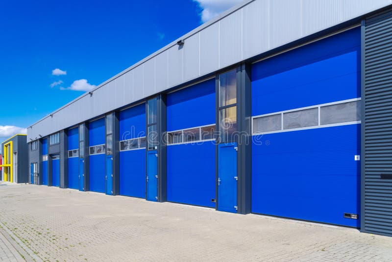 Blue industrial units stock photo. Image of delivery - 259380924