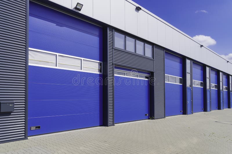 Blue industrial units stock image. Image of door, company - 259380941