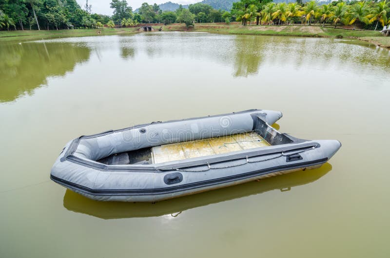 Blue inflatable boat stock photo. Image of coast, gear - 32254028