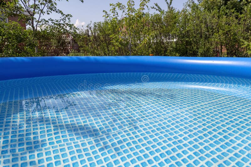 Blue inflatable pool stock image. Image of enjoy, brightness - 197945137