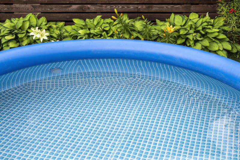 Blue inflatable pool stock image. Image of leisure, design - 197945561