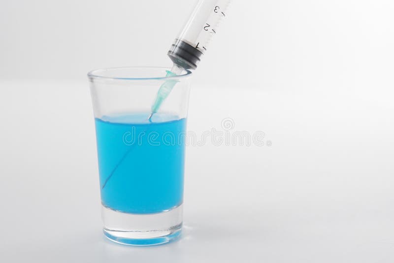 Blue Injection. Syringe on a White Background. Stock Image - Image of ...