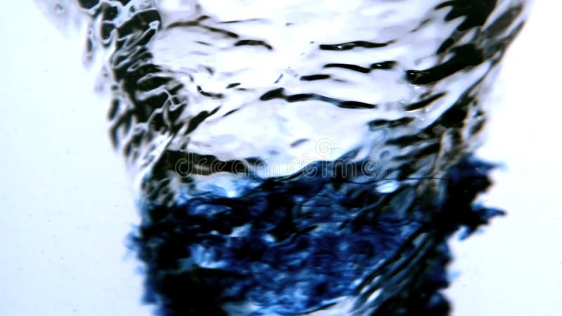 Blue Ink Swirling into Water Whirlpool on White Background Stock ... Blue Ink Swirling into Water Whirlpool on White Background Stock ...