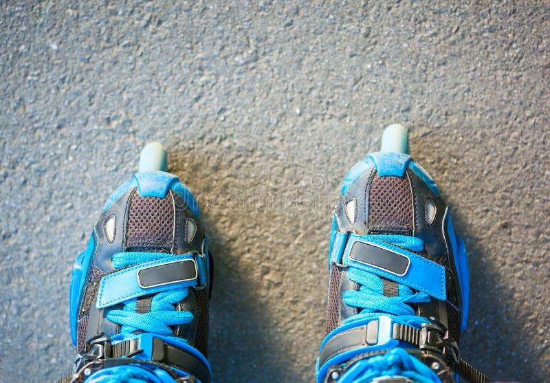 Blue Inline Roller Skates - First Person View. Stock Image - Image of ...