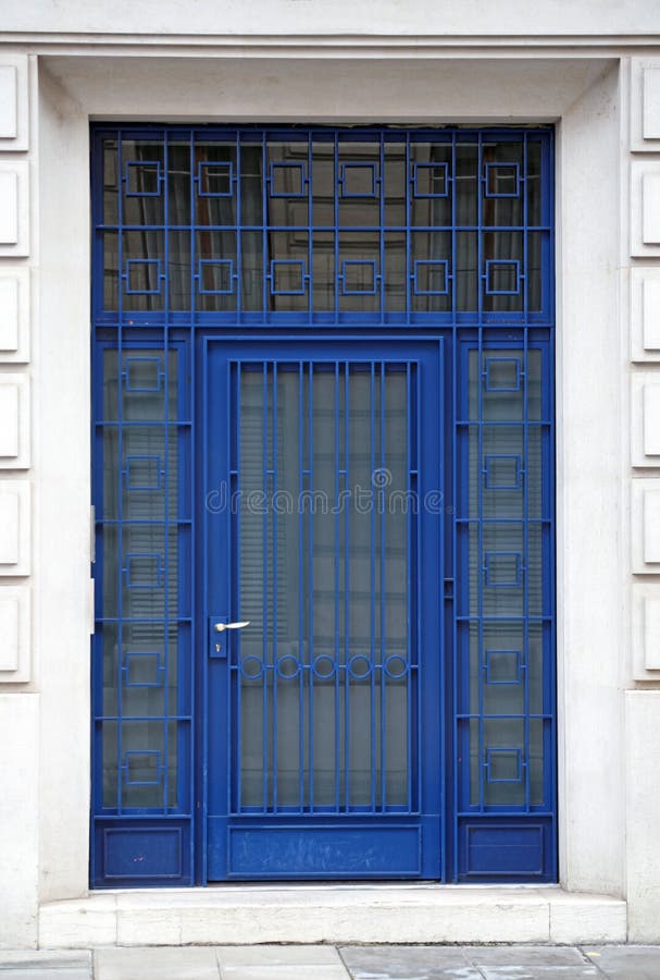 Blue Iron Door Entrance with White Walls Stock Image - Image of steel ...