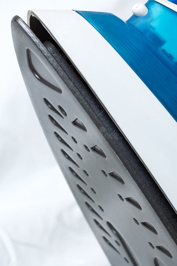 Blue Iron on a White Sheet, Ironing Stock Image - Image of watt, chores ...