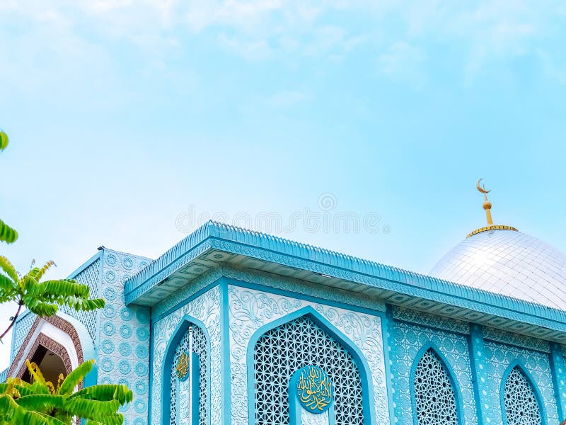 Blue Islamic Mosque with Crescent Dome and Calligraphy Stock Photo ...