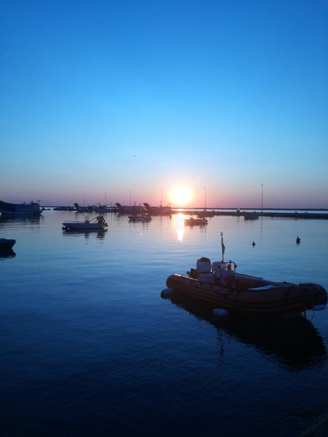 Blue italian sun rising stock photo. Image of rise, rising - 163535258